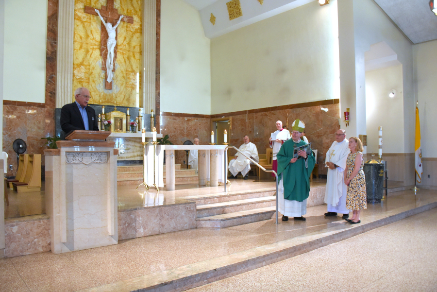 Bishop Deeley presents the Matthew 25 Award to the St. Thérèse Food ...