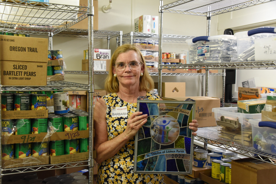 Bishop Deeley presents the Matthew 25 Award to the St. Thérèse Food ...