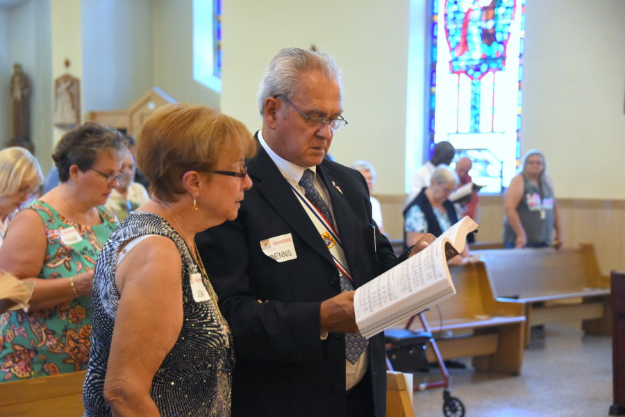 Bishop Deeley presents the Matthew 25 Award to the St. Thérèse Food ...