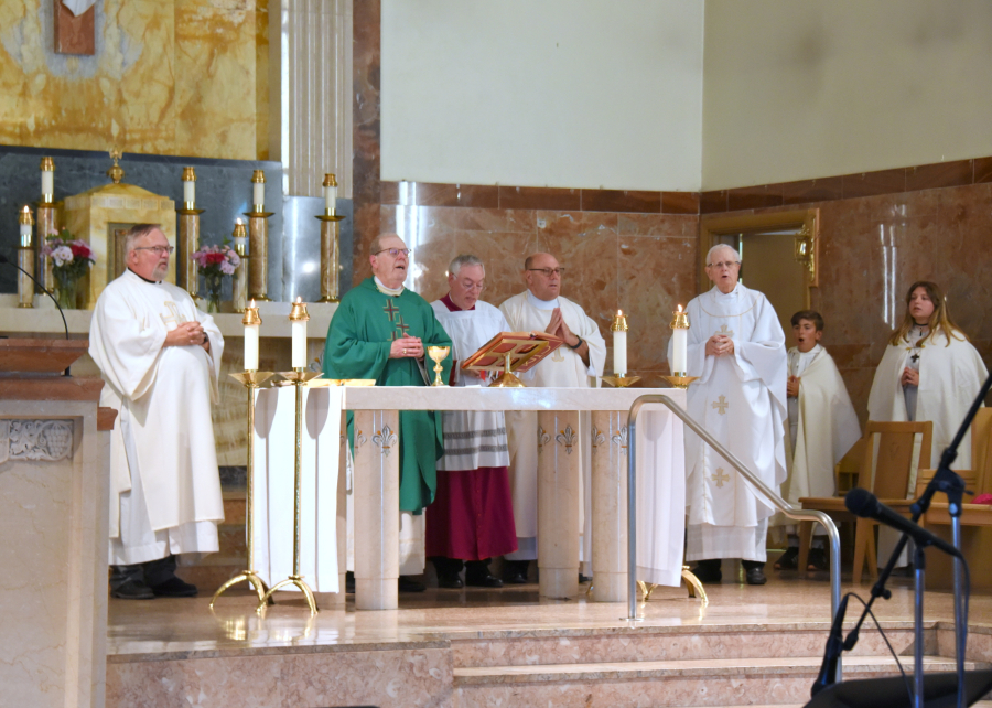 Bishop Deeley presents the Matthew 25 Award to the St. Thérèse Food ...